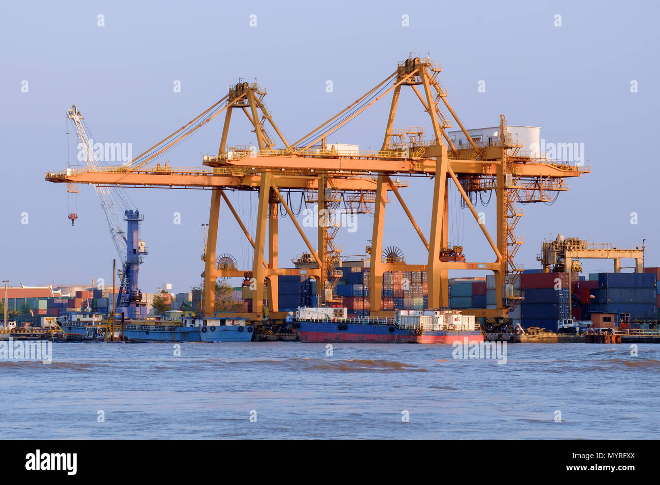 View of crane bridge working in dock Stock Photo - Alamy