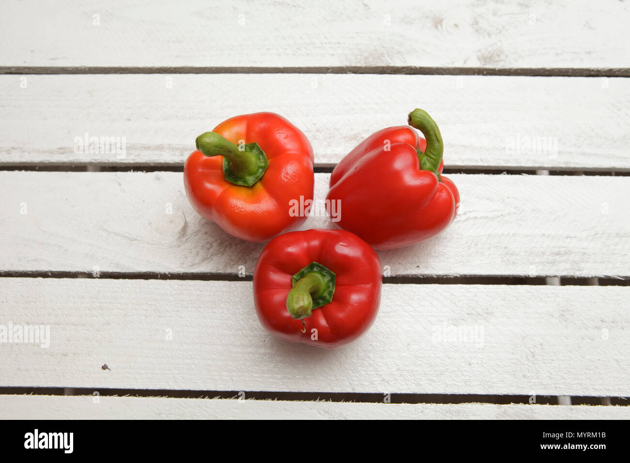 Three red peppers hi-res stock photography and images - Alamy