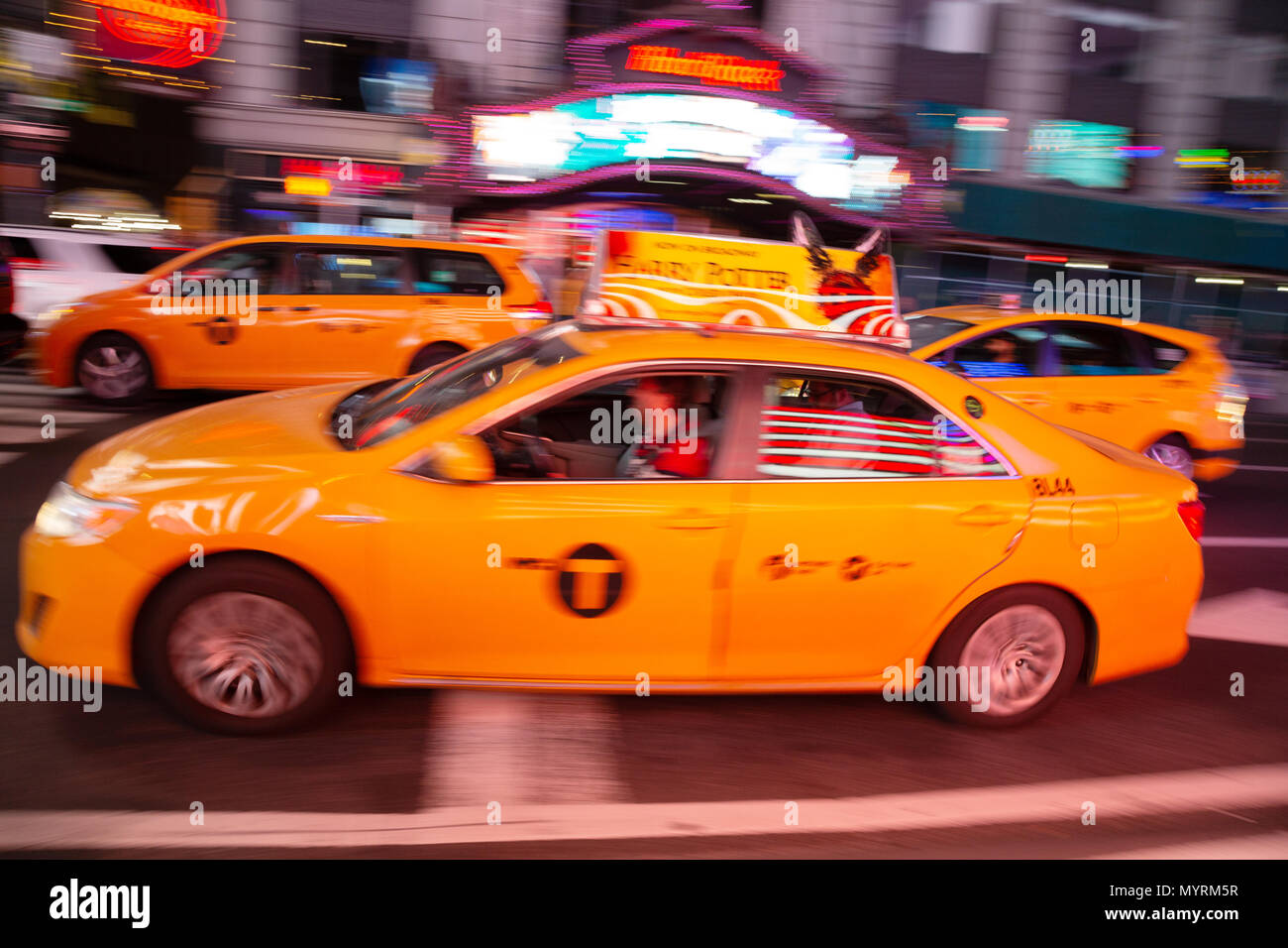 New York yellow taxi cabs in Times Square at night, Times Square, New York city USA Stock Photo ...