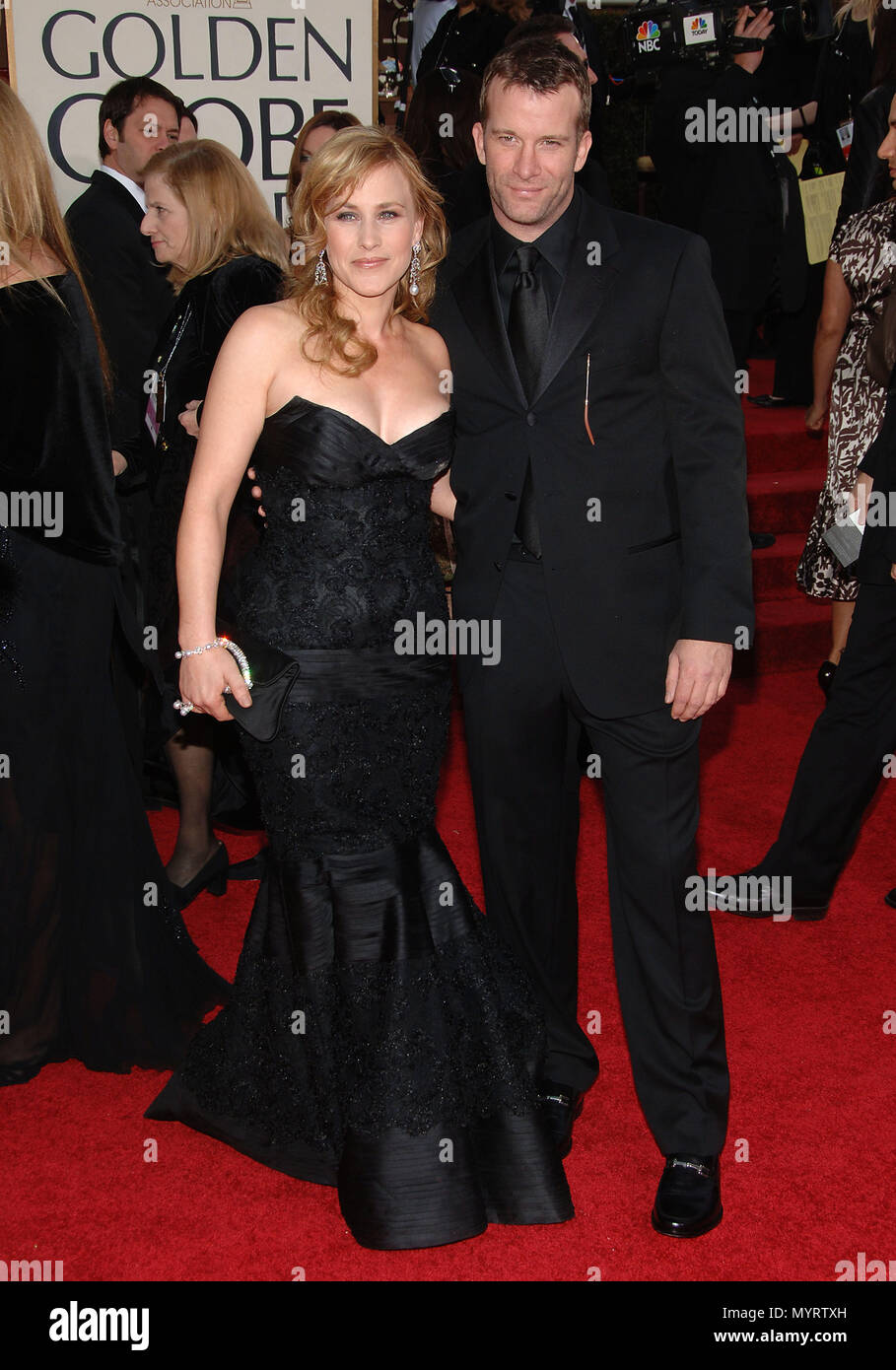Patricia Arquette and husband Thomas Jane arriving at the Golden Globes ...