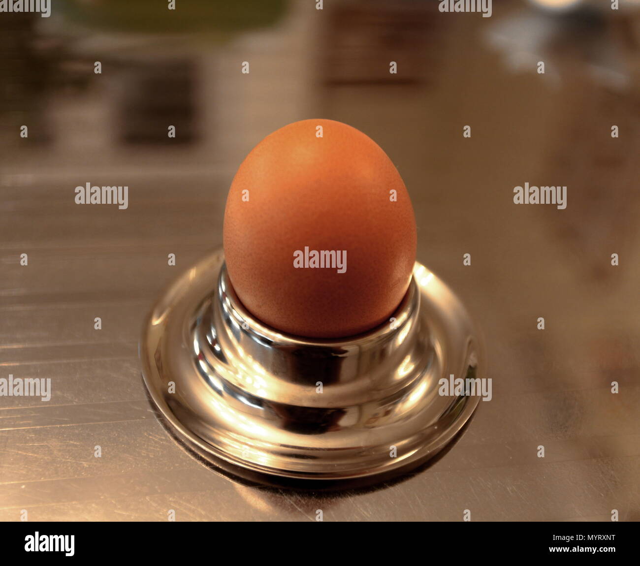 boiled egg on a metal stand Stock Photo - Alamy