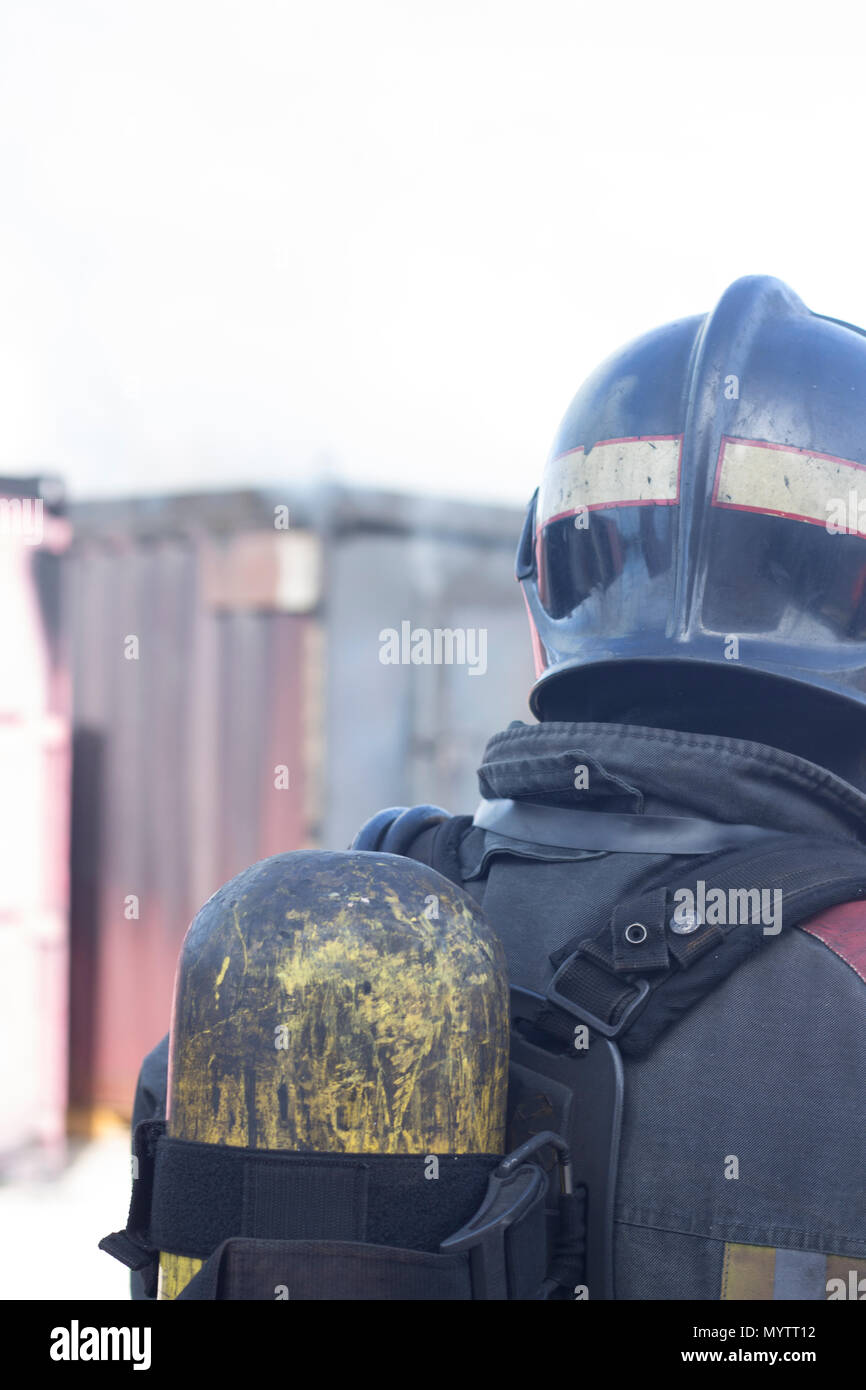 Firefighter putting out fire training station extinguisher backdraft ...