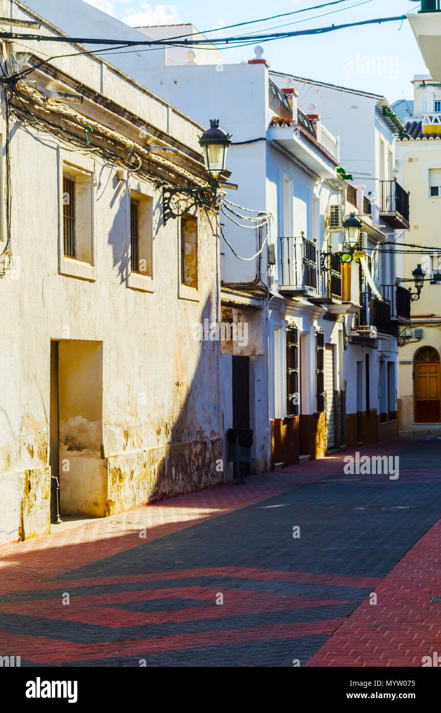 beautiful, picturesque street, narrow road, white facades of buildings ...