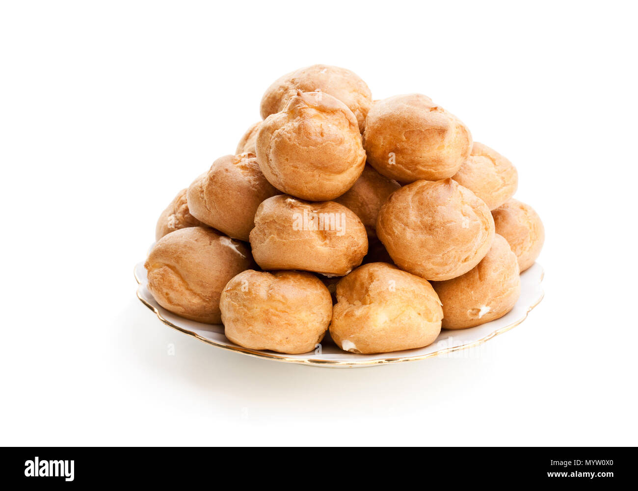 Profiteroles on white Cut Out Stock Images & Pictures - Alamy