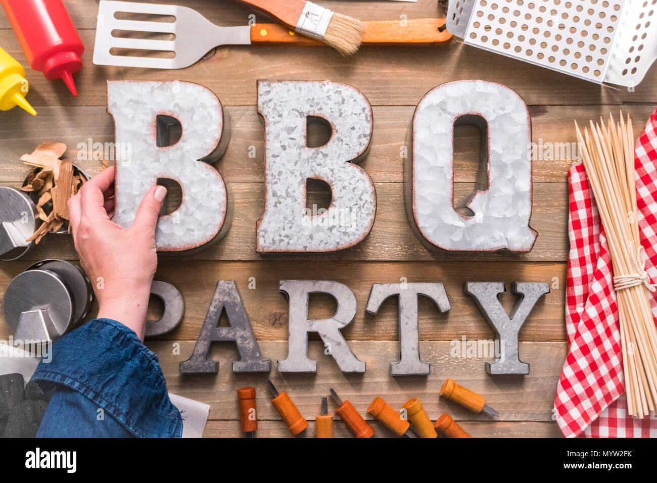 Metal BBQ Party sign with grilling tools on wood background Stock Photo ...