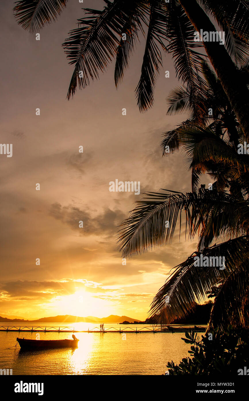 Colorful sunset at Nananu-i-Ra Island, Fiji. Tourism is the main ...