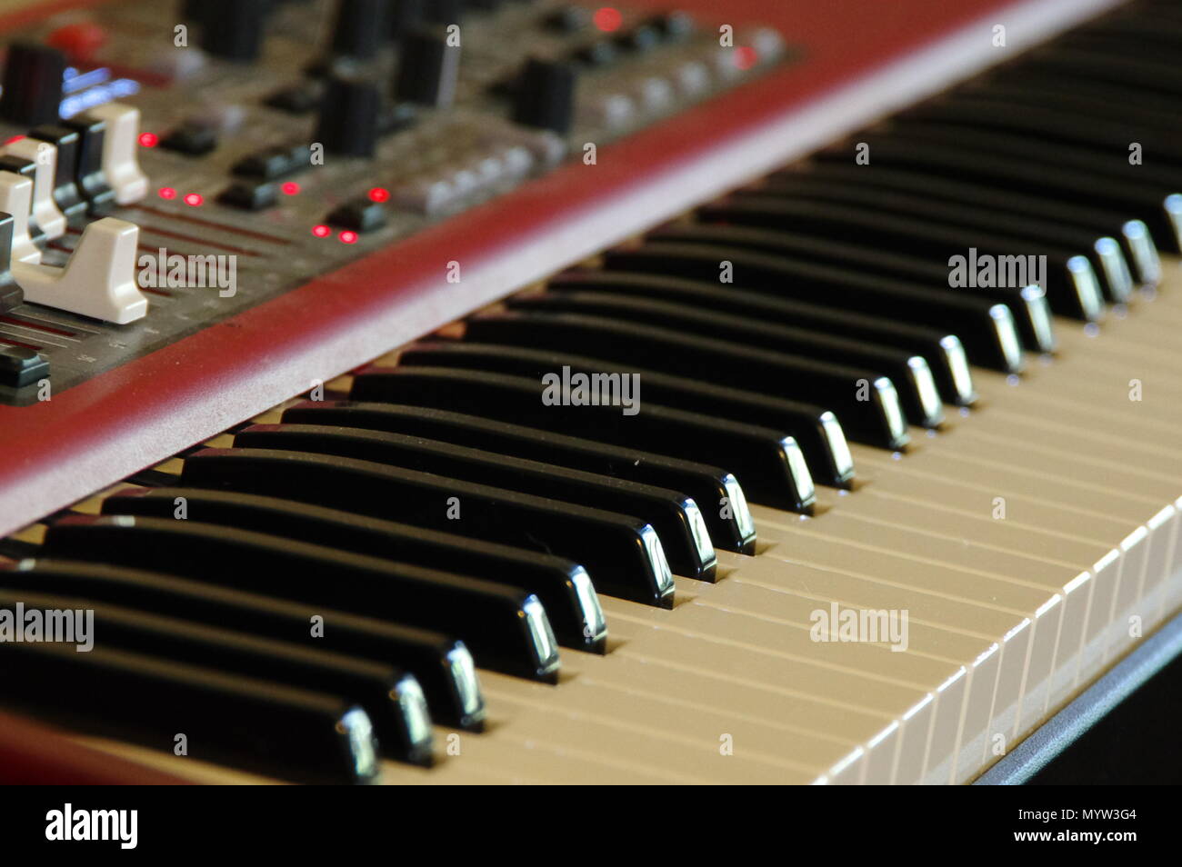 Red Electric Piano Keyboard Stock Photo - Alamy