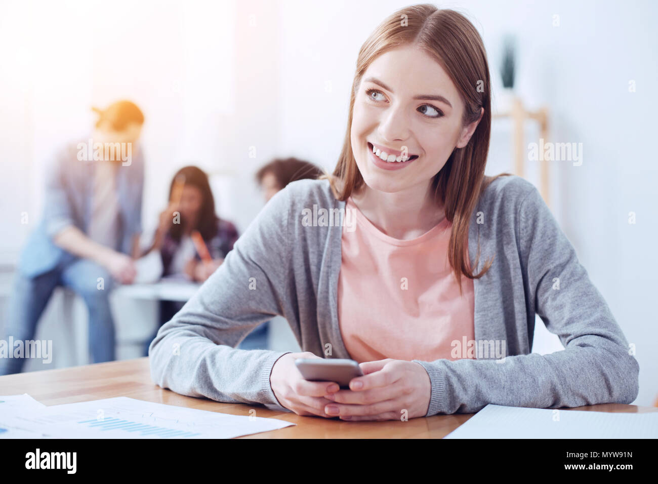Dreamy woman having interesting plan Stock Photo - Alamy