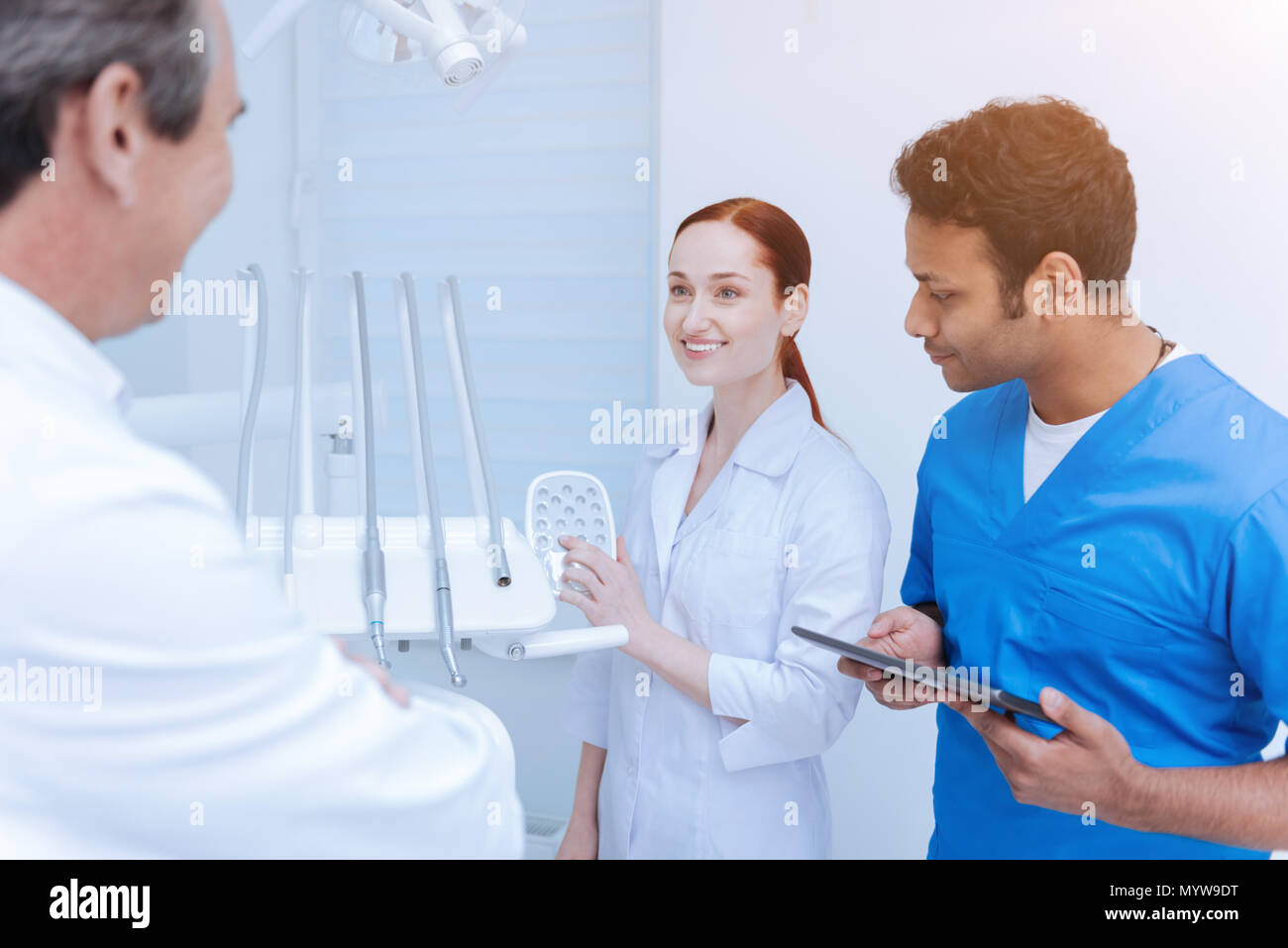 Cheerful female asking for help Stock Photo - Alamy
