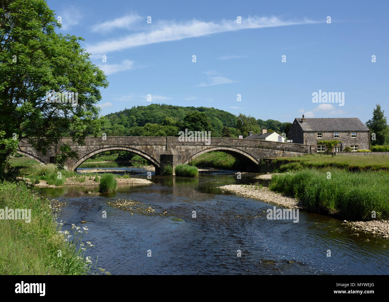 Stone bridge with segmental arches over river ribble in Sawley, Forest ...