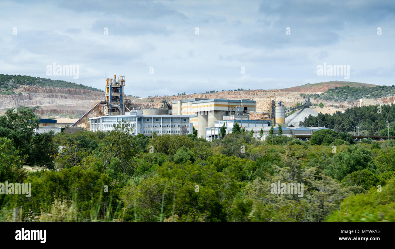 A huge and working cement production plant production factory on mining ...