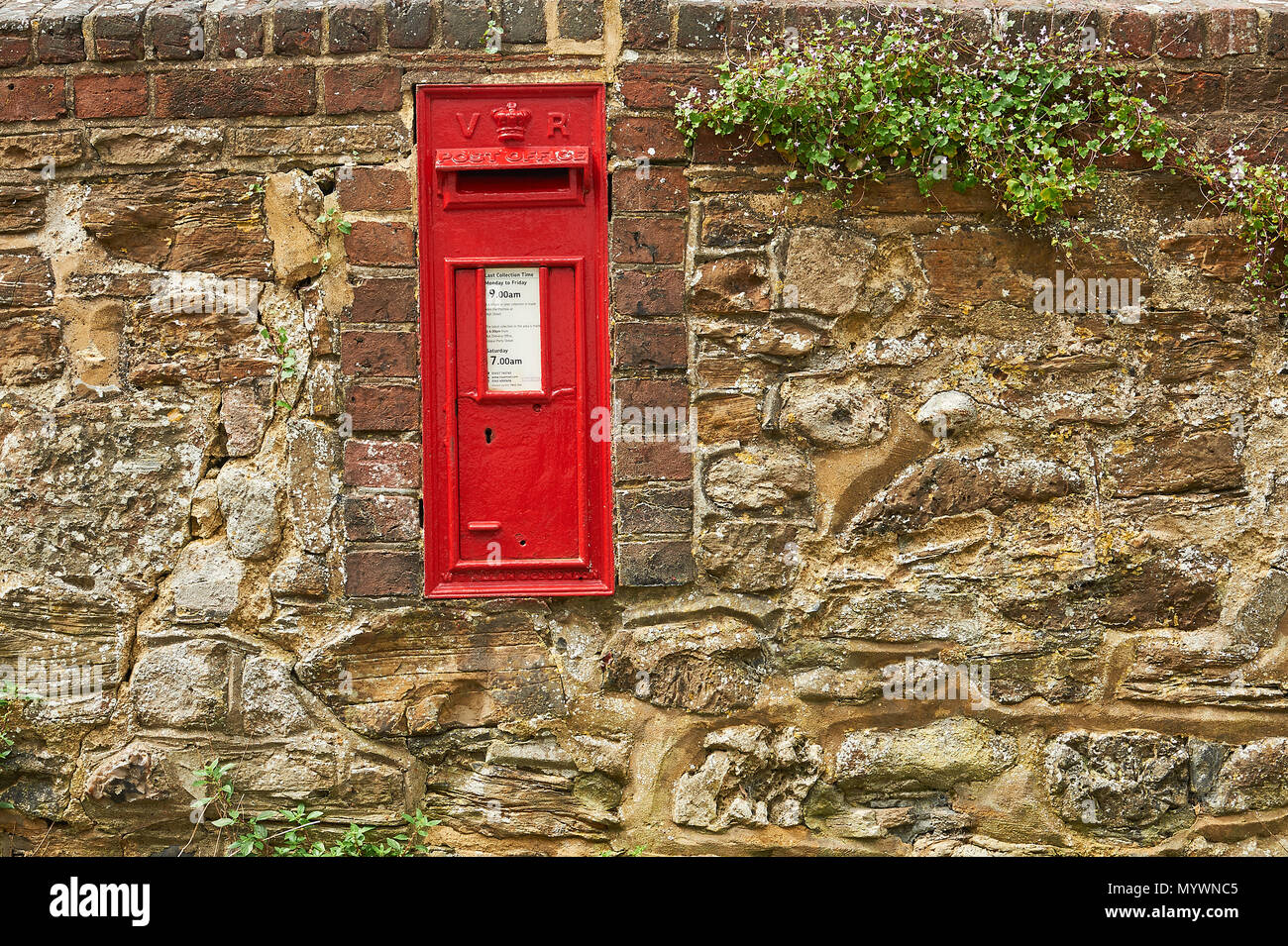 Red Royal Mail letter box in a stone way Stock Photo - Alamy
