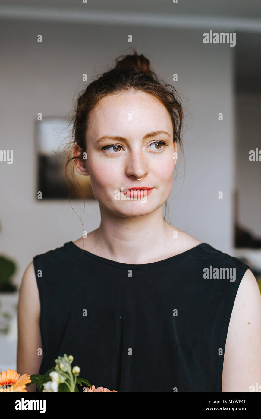 portrait of sceptically smiling caucasian woman Stock Photo - Alamy