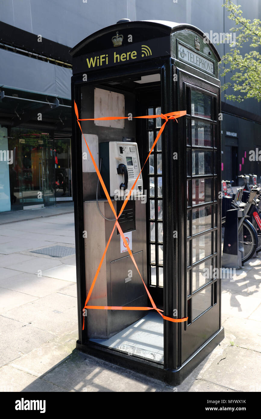 Out of order telephone box hi-res stock photography and images - Alamy