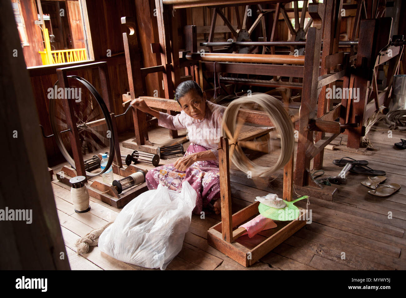 Hand spinning of lotus silk, a rare material that is made in ...
