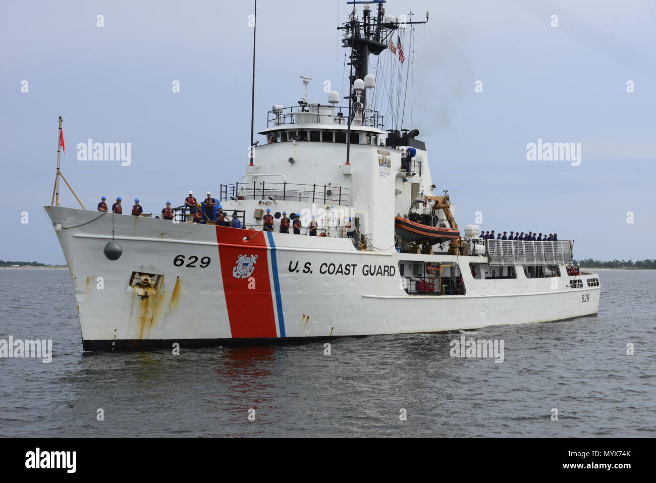 Coast Guard Cutter Decisive's crew stands ready to moor at their new ...