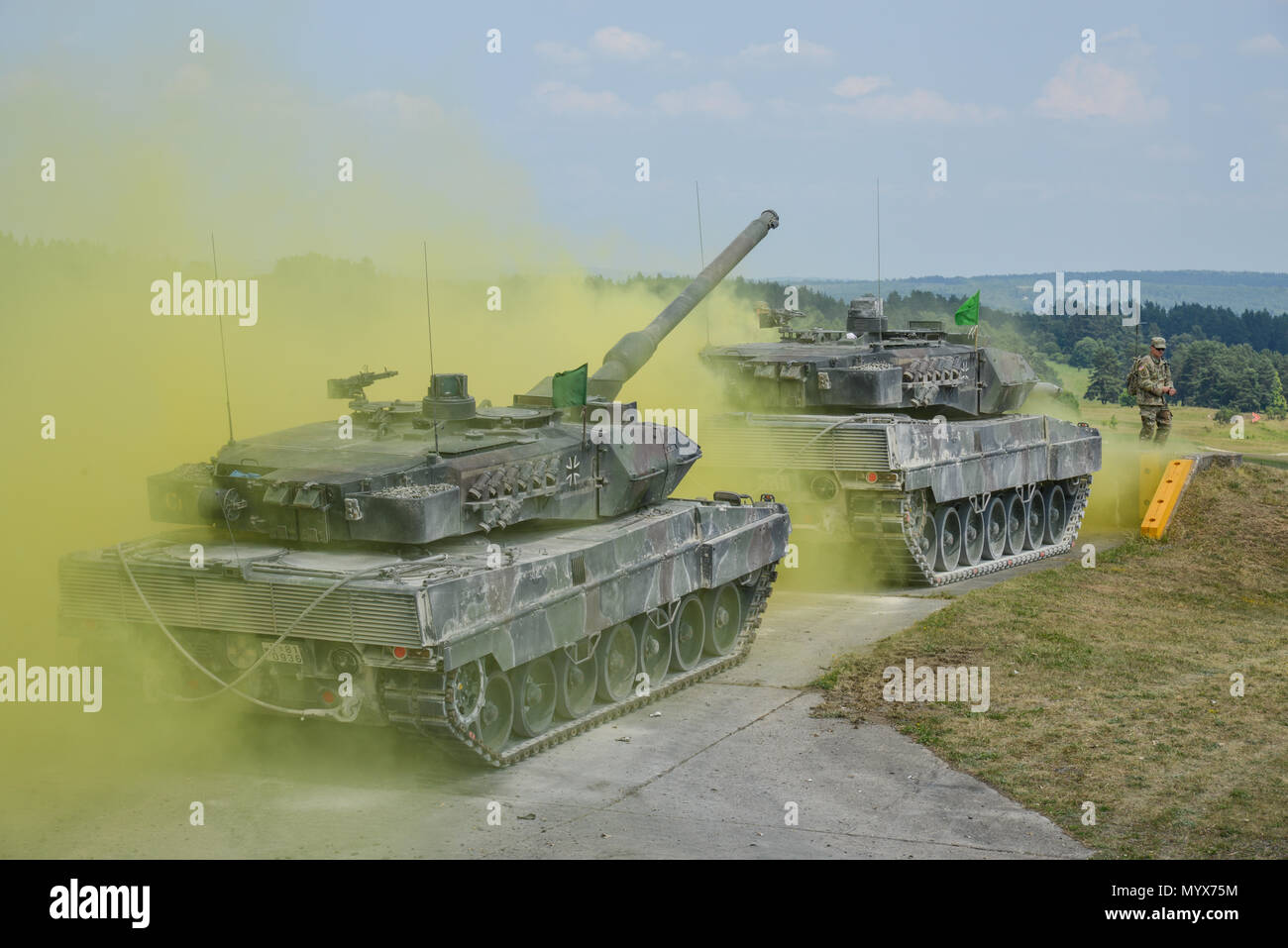 German soldiers assigned to the 3rd Panzer Battalion operate Leopard ...