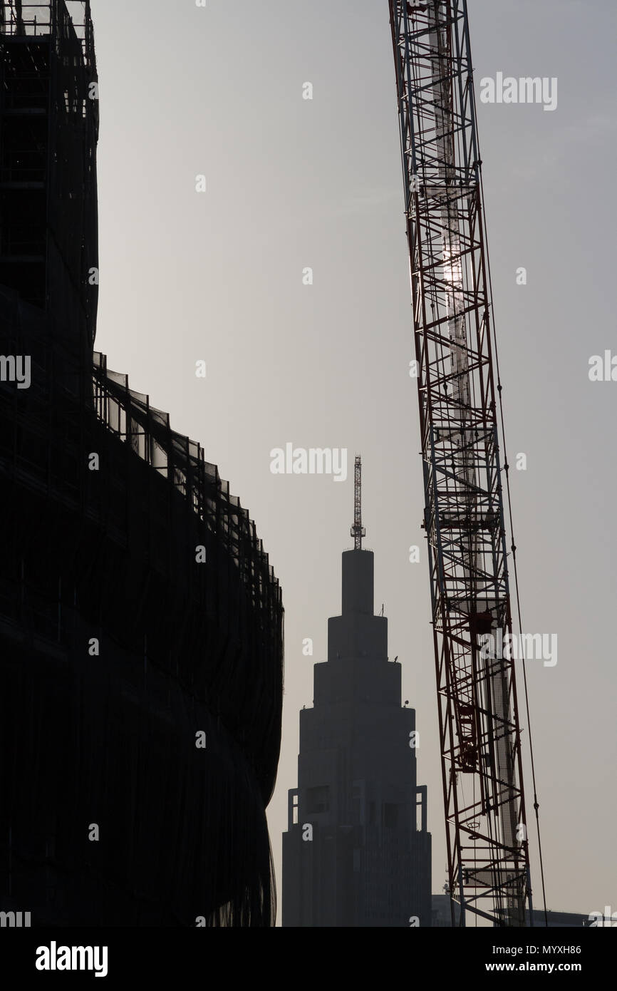 The distinctive NTT Docomo Tower seen behind the new National Stadium ...