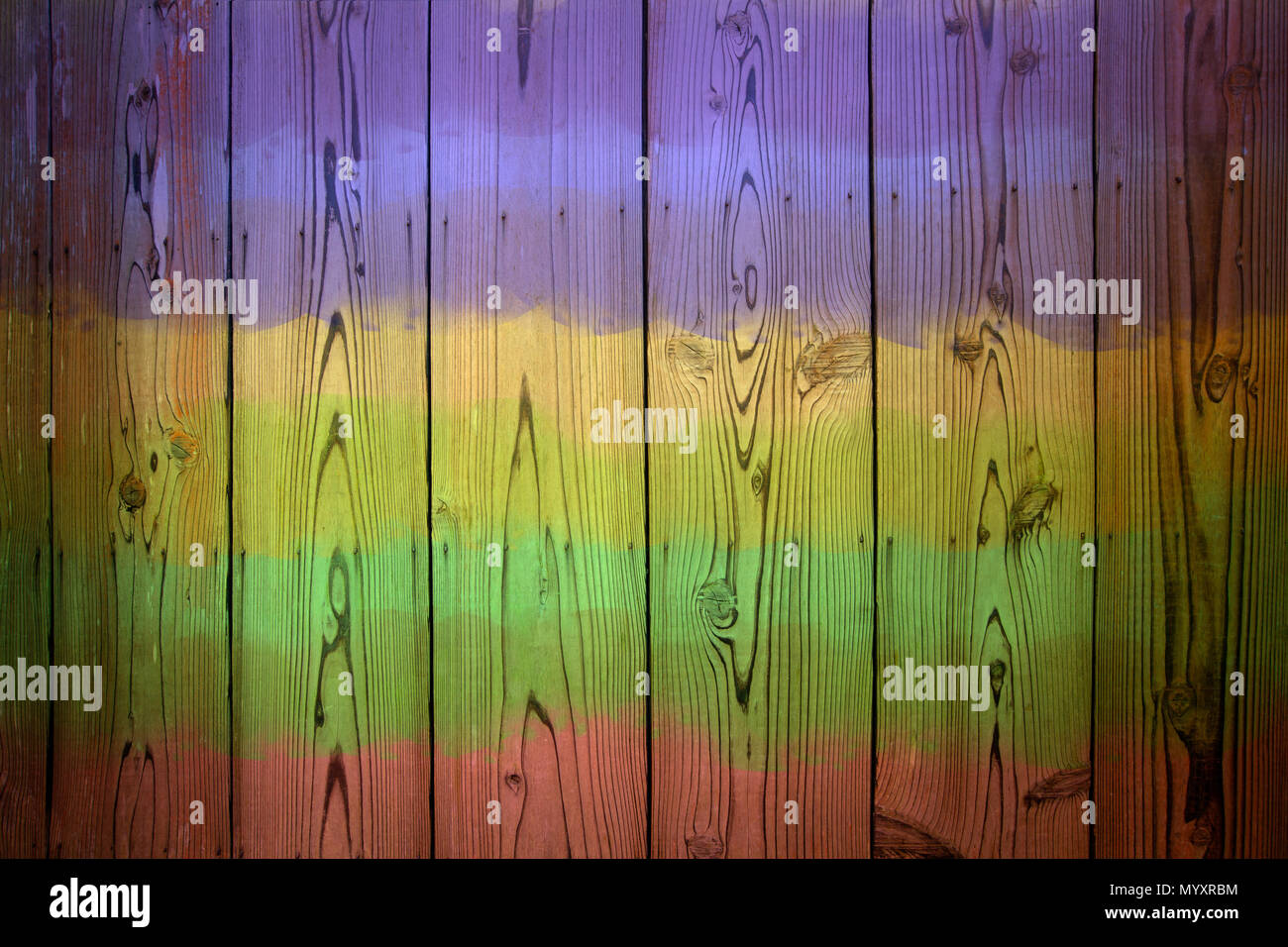 Multi difference colors on wooden wall for background Stock Photo - Alamy