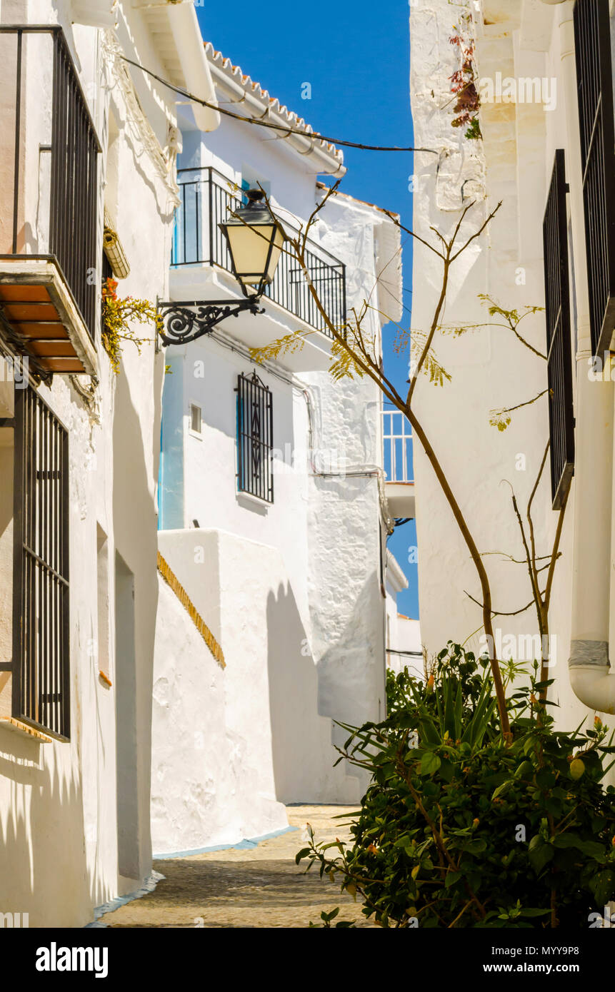 beautiful, picturesque street, narrow road, white facades of buildings ...