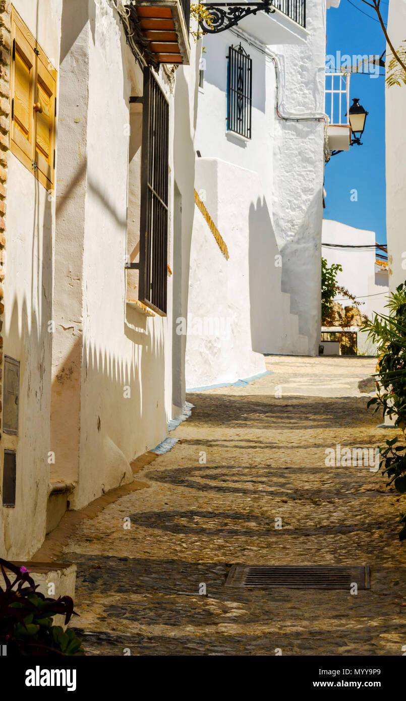 beautiful, picturesque street, narrow road, white facades of buildings ...