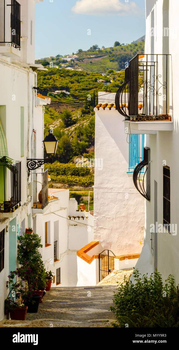 beautiful, picturesque street, narrow road, white facades of buildings ...
