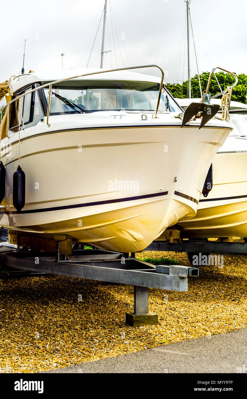 Boat on stand on the shore, close up on the part of the yacht, luxury ...