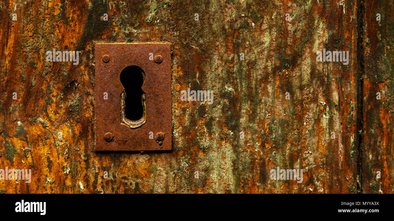 keyhole in an old door with an interesting texture, a remnant of an old ...