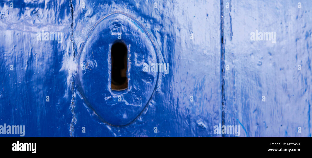 keyhole in an old door with an interesting texture, a remnant of an old ...