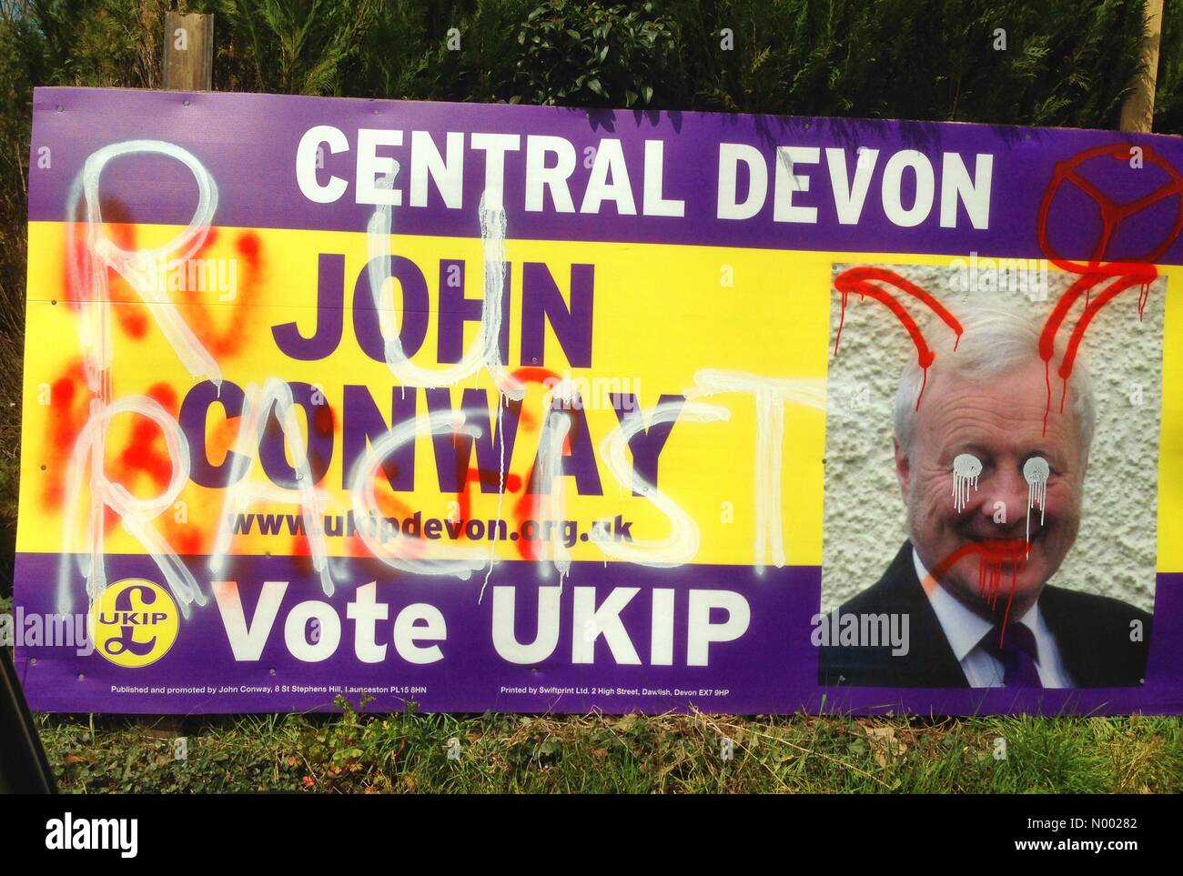 Defaced UKIP election poster in Christow, Devon Stock Photo - Alamy