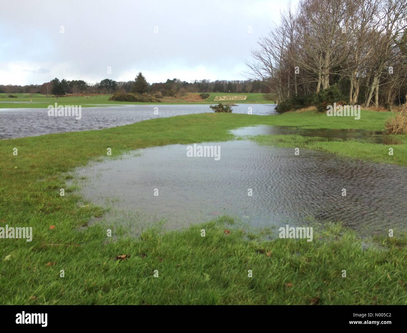 Killarney Golf and Fishing Club flooded golf course tee. Lake high ...