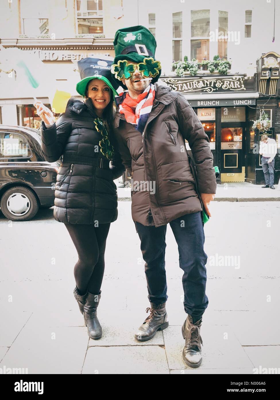 Rupert St, London, UK. 17th Mar, 2016. Couple celebrating St Patrick's ...