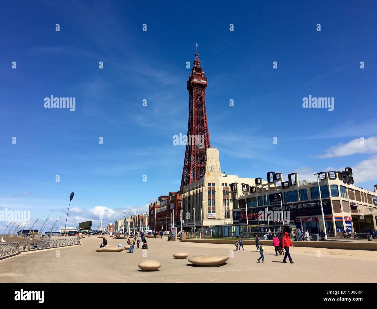 UK Weather sunny day in Blackpool. Tower and promenade on a sunny but ...