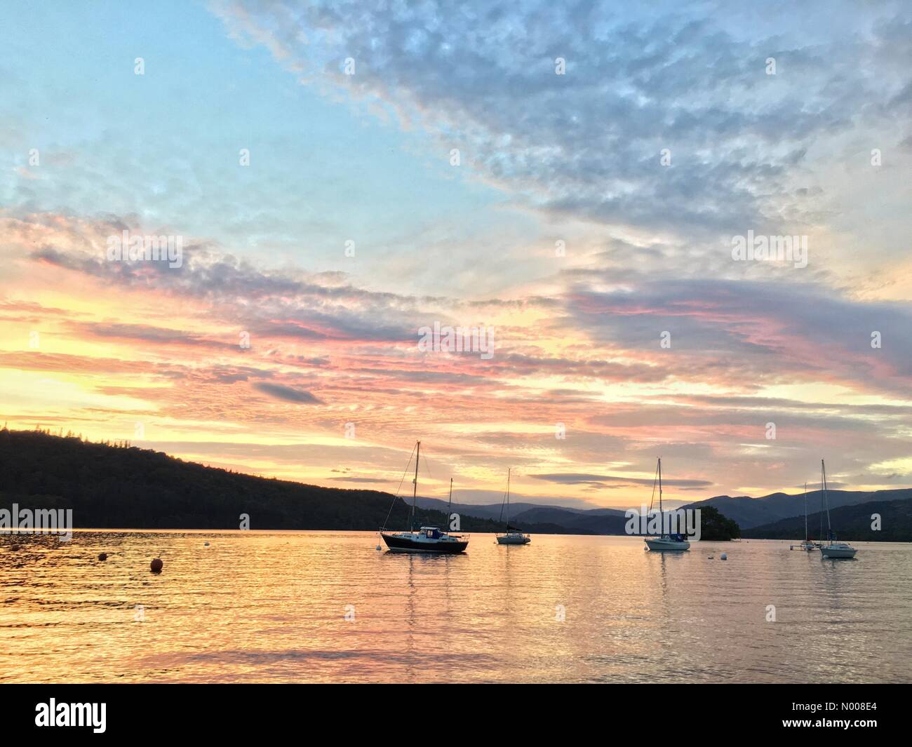 Bowness-on-Windermere, UK. 29th August, 2016. UK Weather: Sunset over ...