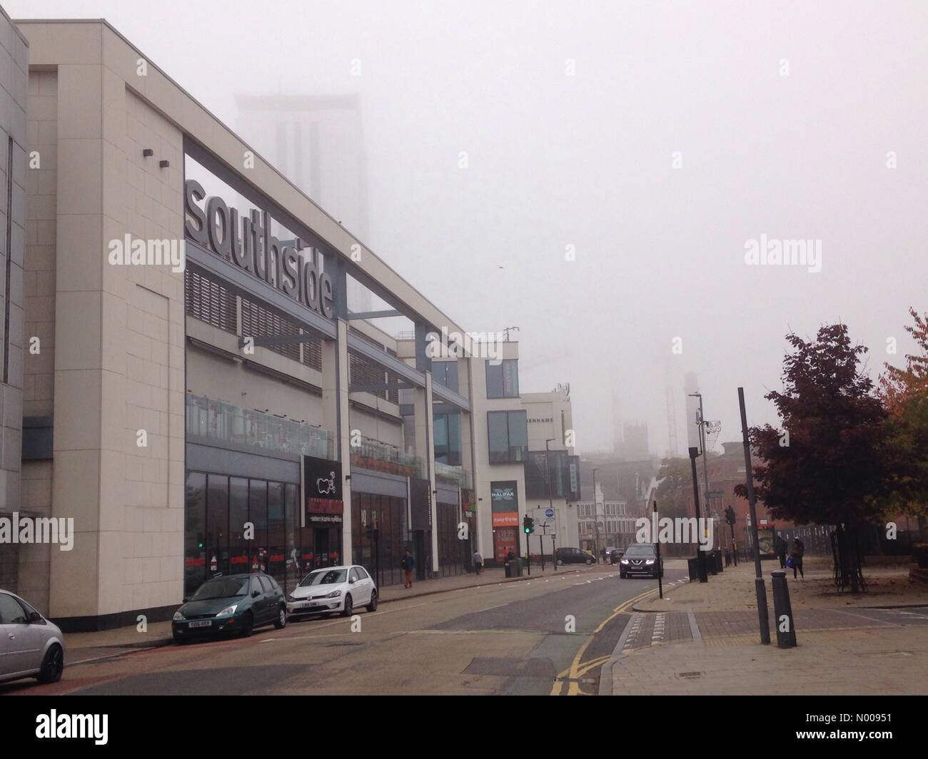 UK Weather - a foggy start to the morning outside Southside shopping ...