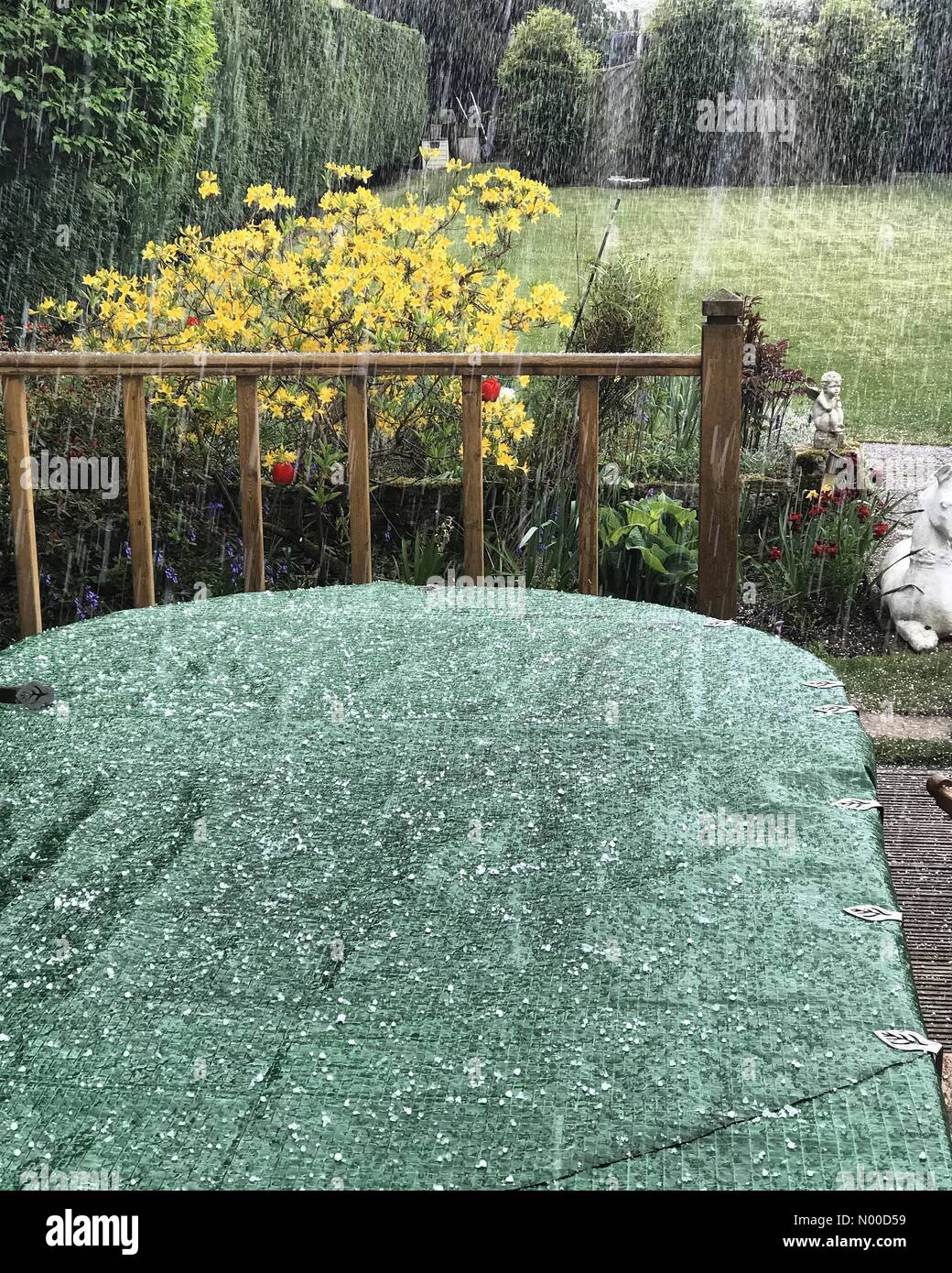 Busbridge Ln, Godalming, UK. 26th Apr, 2017. UK Weather: Hailstorm over ...