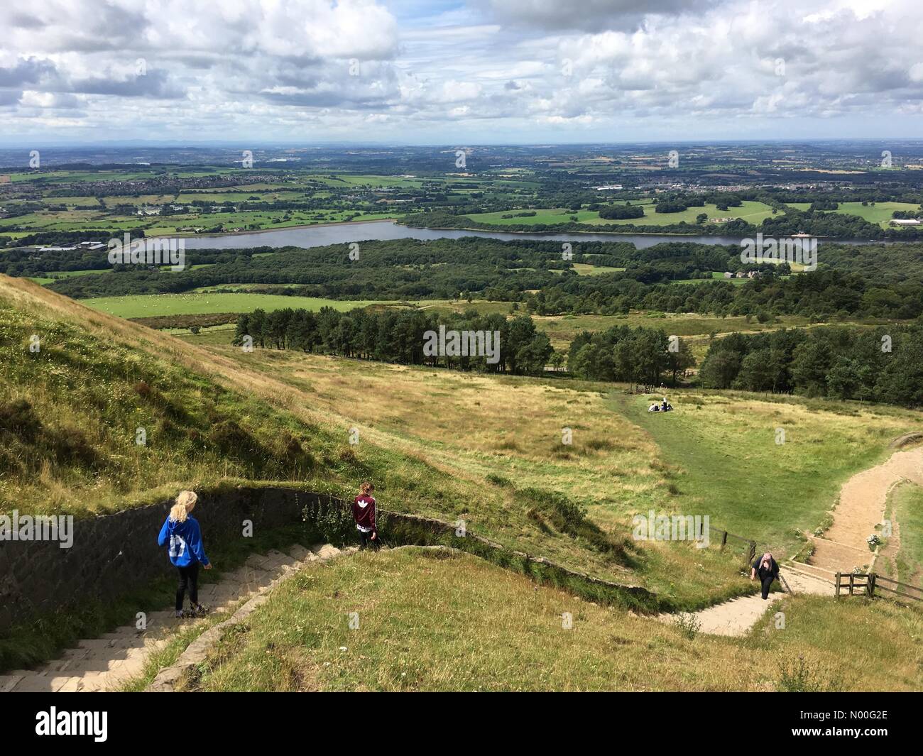 UK Weather: Sunny morning in Rivington. Family walking down from ...