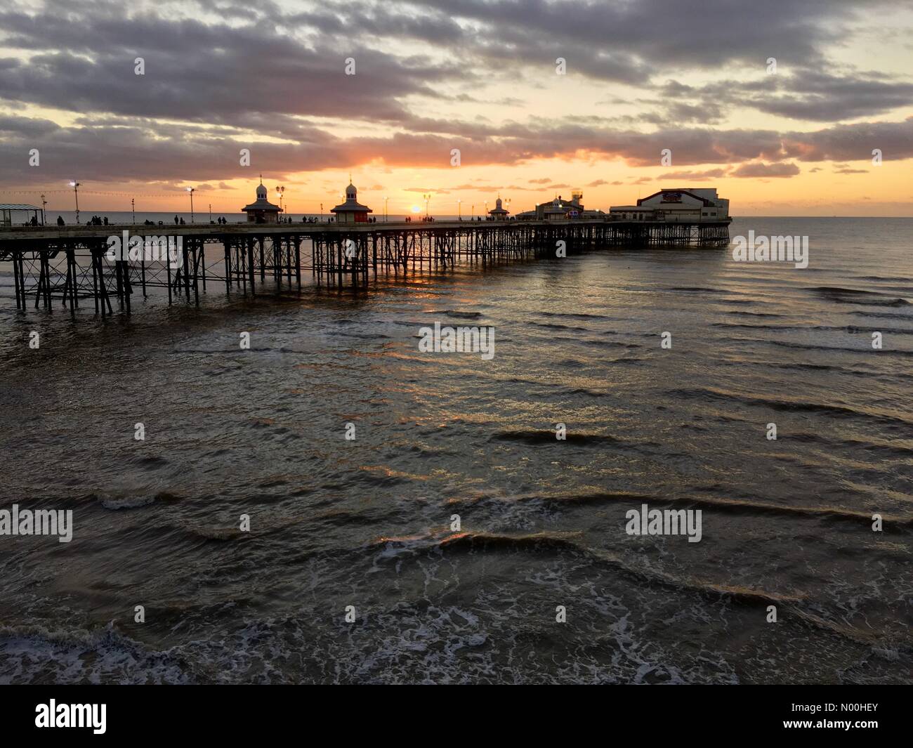 UK Weather: Sunset at Blackpool. Sunset over North Pier after a lovely ...