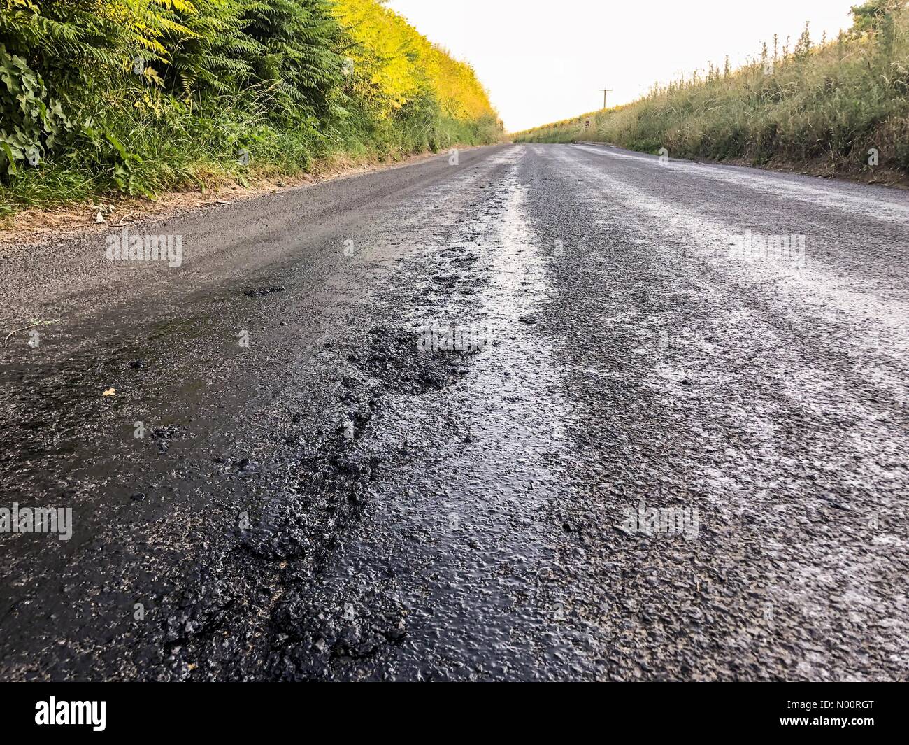 Road melting heat hi-res stock photography and images - Alamy