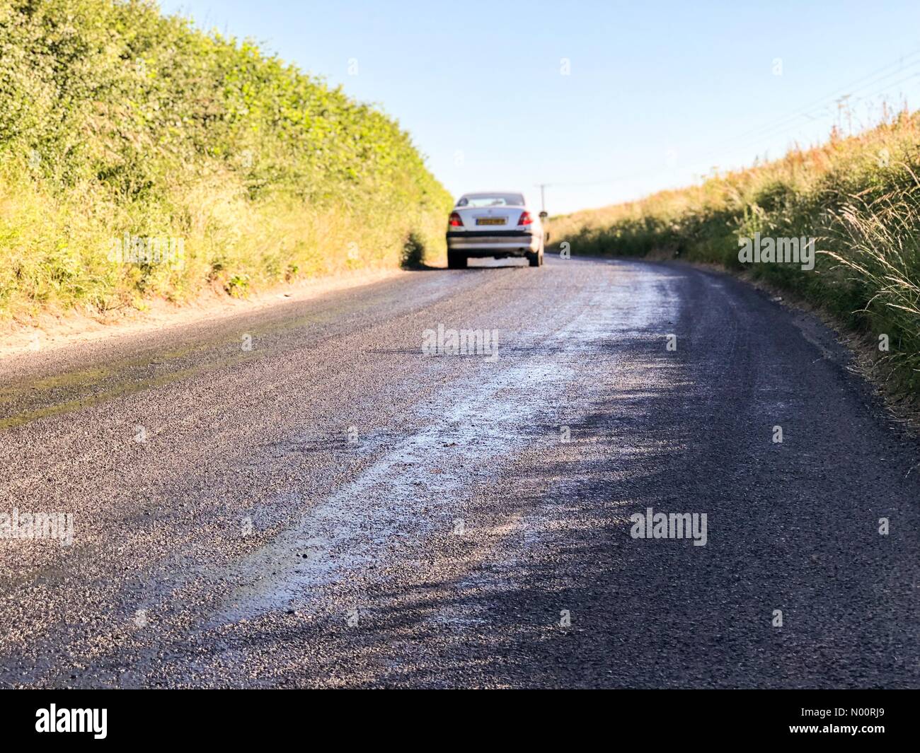 Godalming, UK. 26th Jun, 2018. UK Weather: Melted roads in Godalming ...