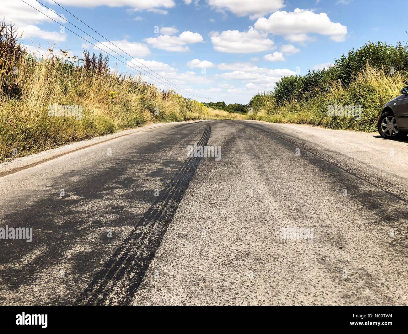 Melted tarmac heat hi-res stock photography and images - Alamy