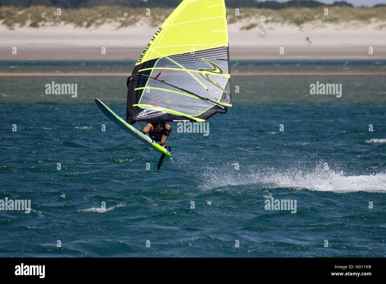 Hampshire beach windsurfing hi-res stock photography and images - Alamy