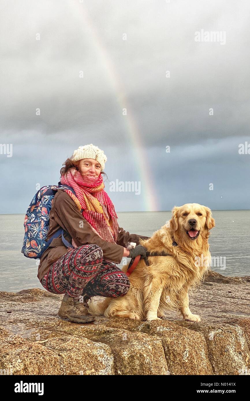 Dawlish, Devon. 29th Dec 2020. UK Weather: Rainbow's end over the sea ...
