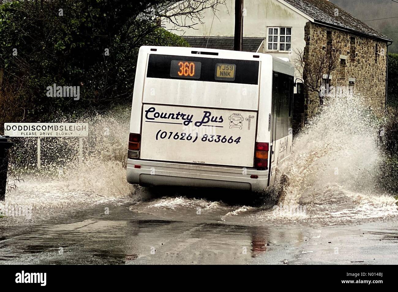 Puddle bus splash hi-res stock photography and images - Alamy