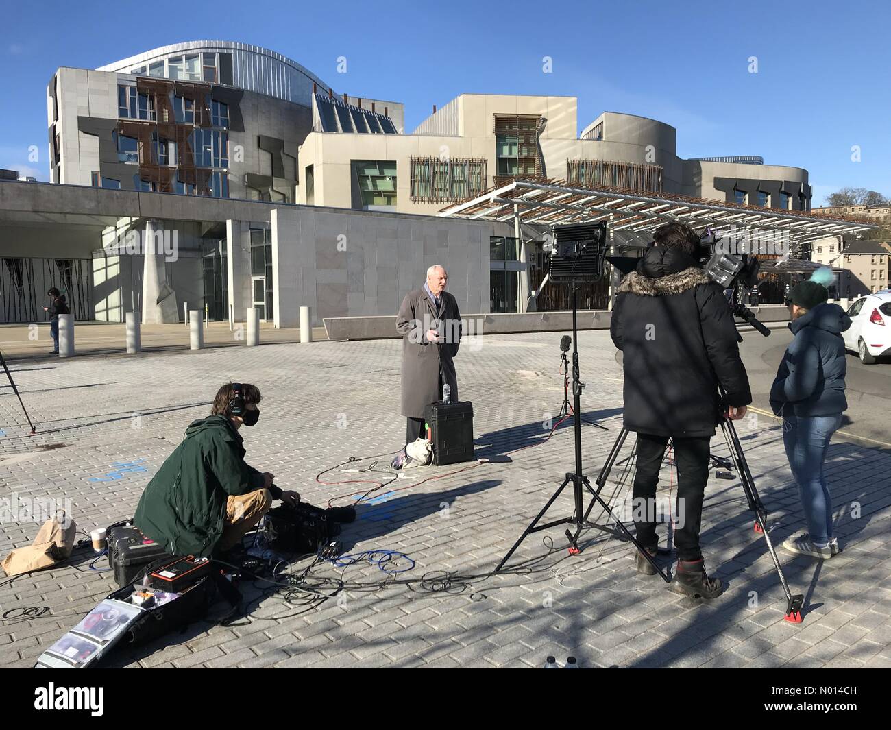 Edinburgh, UK. 26 Feb 2021: Adam Boulton from Sky News live broadcast ...