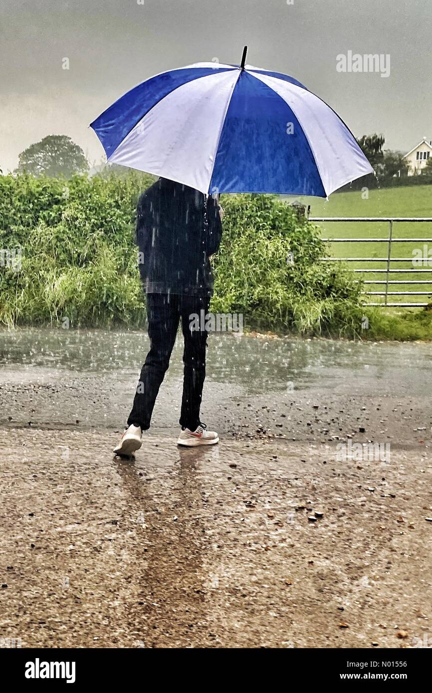 UK Weather: Heavy storm rain yellow weather warning soaks Jack Porter ...