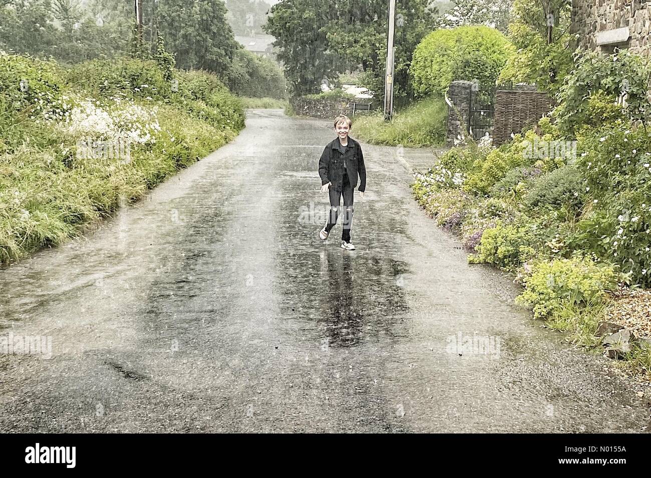 UK Weather: Heavy storm rain yellow weather warning soaks Jack Porter ...