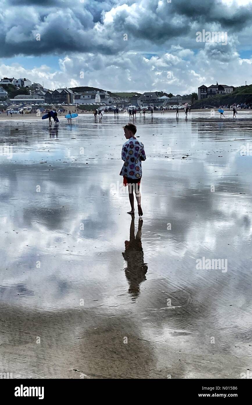 UK Weather: Foreboding sky reflected on Polzeath beach in Cornwall ...