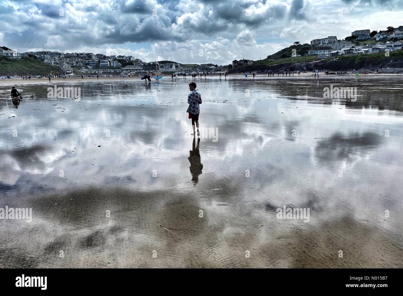 UK Weather: Foreboding sky reflected on Polzeath beach in Cornwall ...