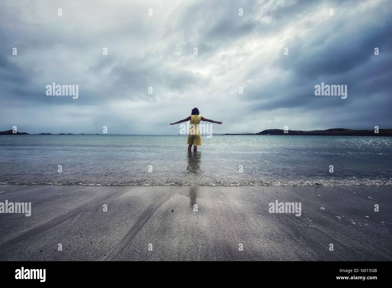 UK Weather: Raich Keene paddles in overcast conditions at Mellon ...